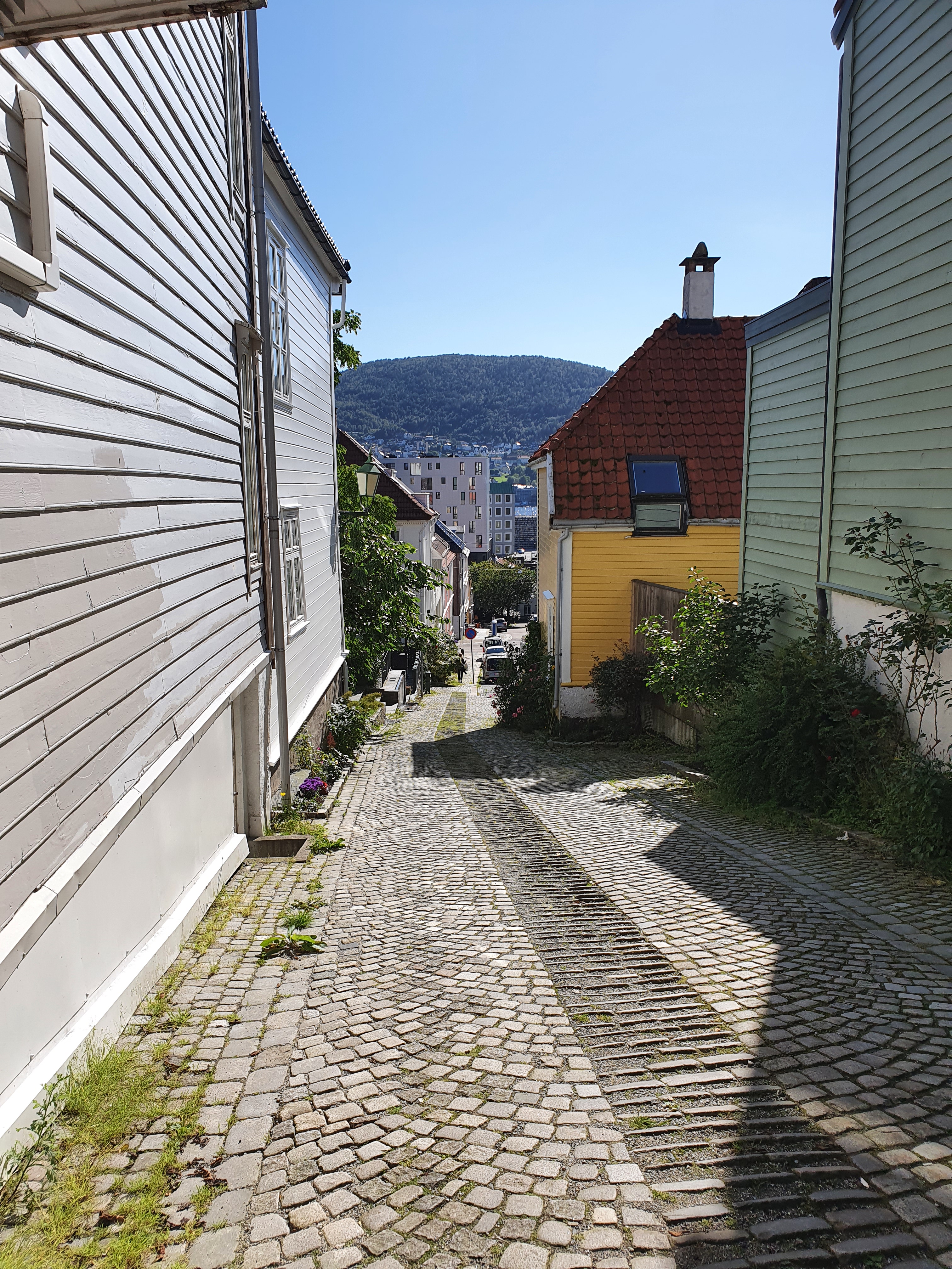 Walking through Nordnes in old Bergen. – The Traveller