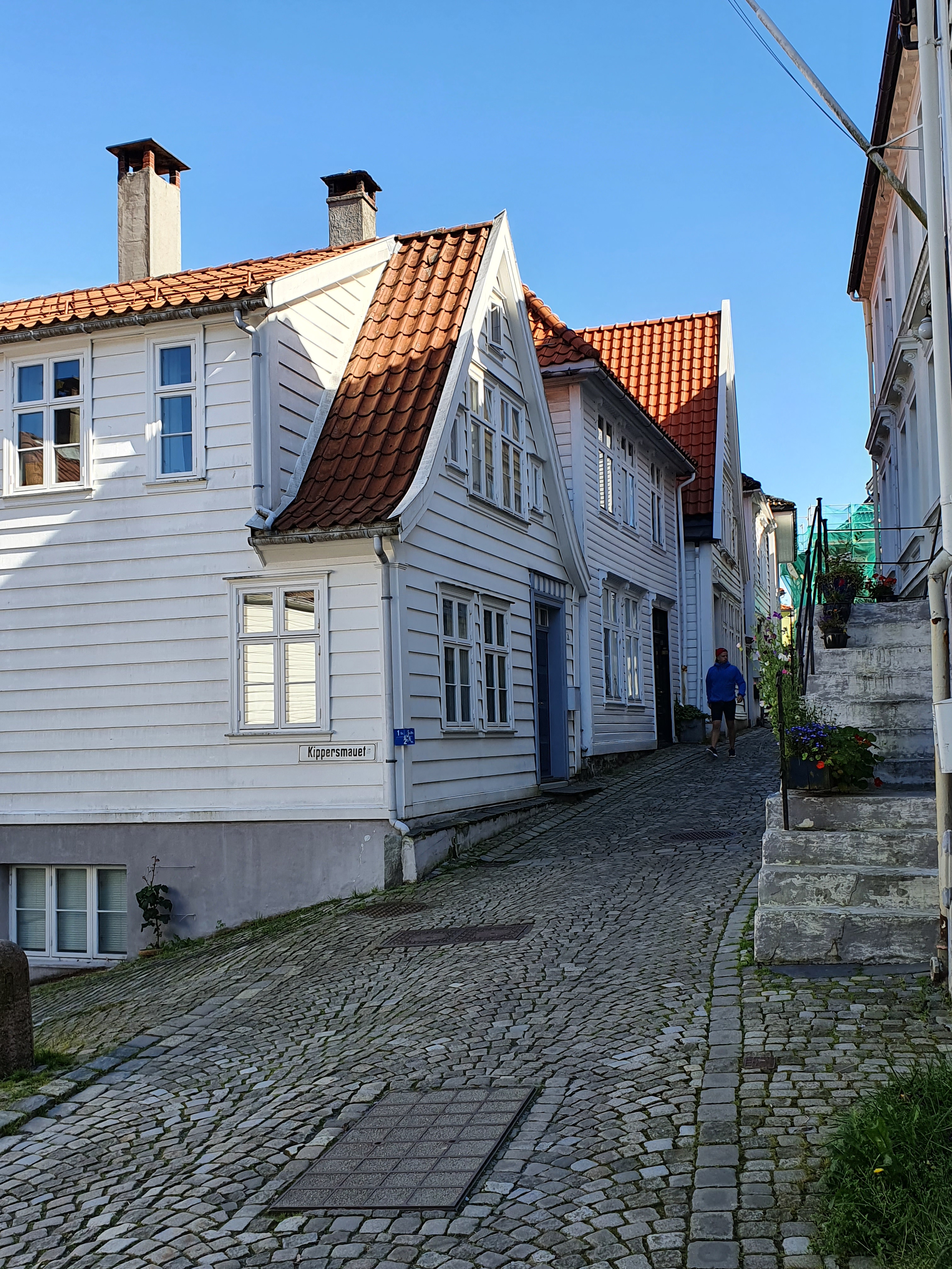 Walking through Nordnes in old Bergen. – The Traveller